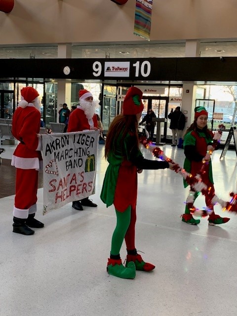 Akron High School "Santa" Marching Band Brings Holiday Fun to the NFTA ...