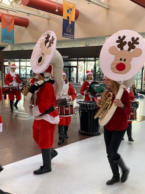 Akron High School "Santa" Marching Band Brings Holiday Fun to the NFTA ...